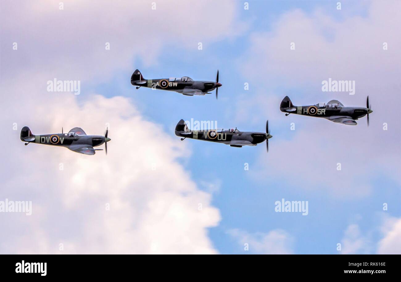 4 Supermarine Spitfires flying over Duxford Stock Photo - Alamy