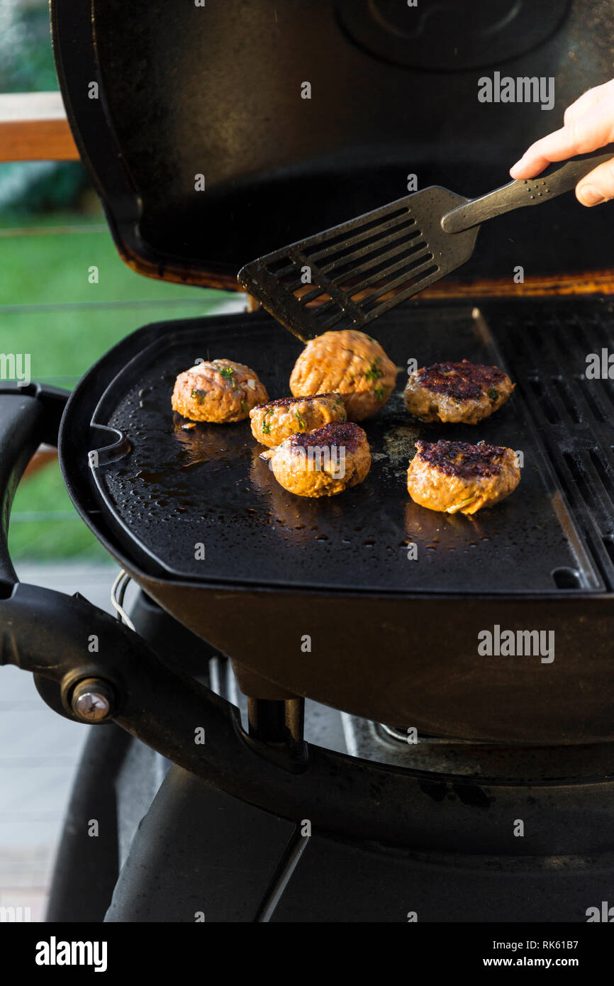 Flipping Burgers High Resolution Stock Photography and Images - Alamy