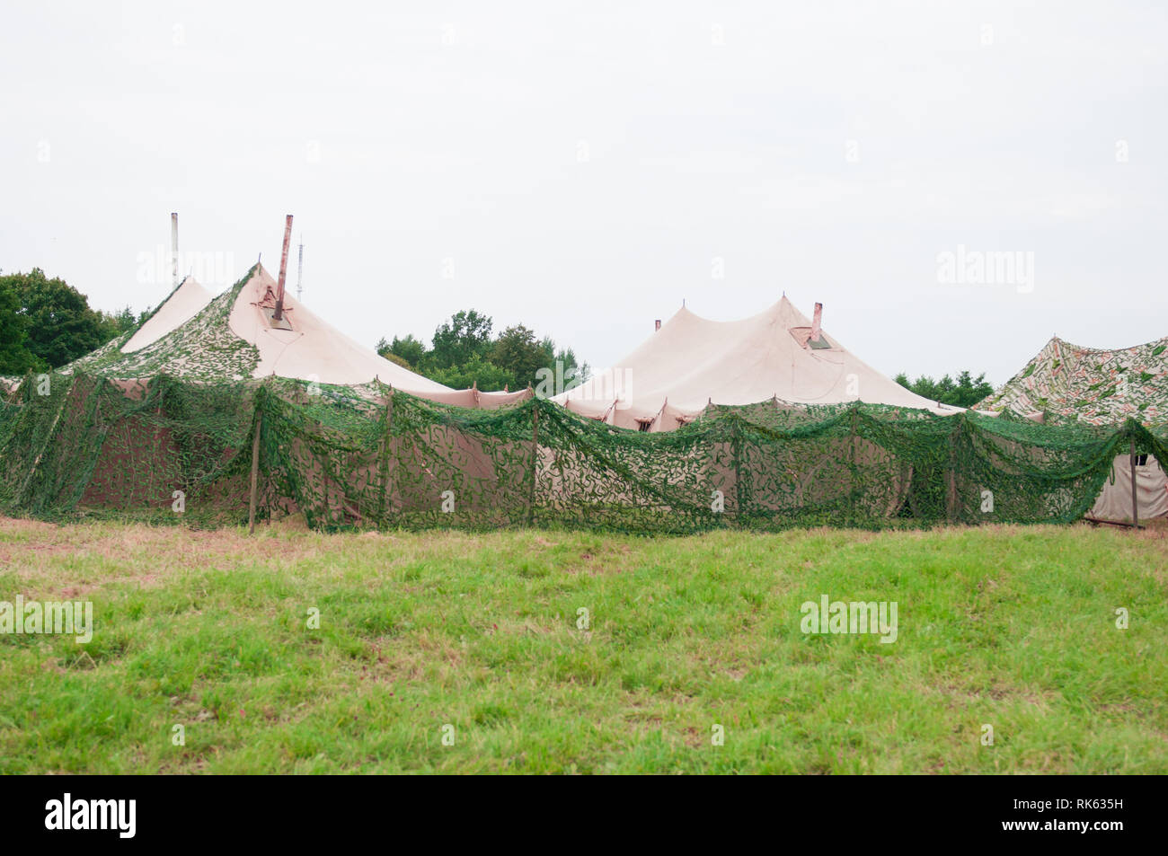 Green army tents hi-res stock photography and images - Alamy