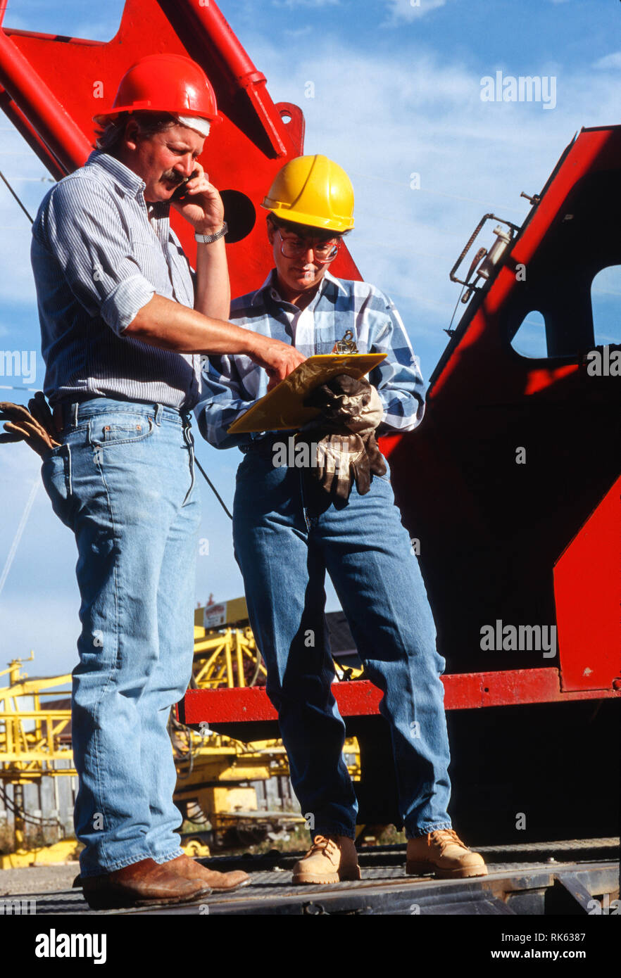 Male and female construction workers at a job site, USA Stock Photo - Alamy