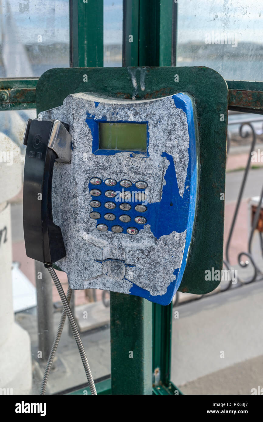 Damaged public telephone box hi-res stock photography and images - Alamy