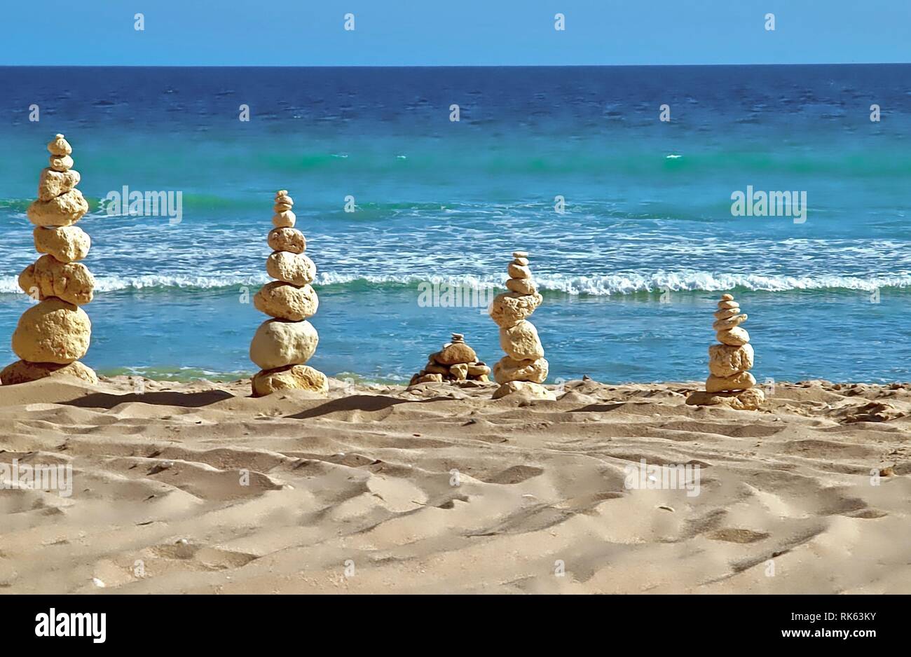 Piles of Stones, pebbles or stack of stones at the beach stand for ...