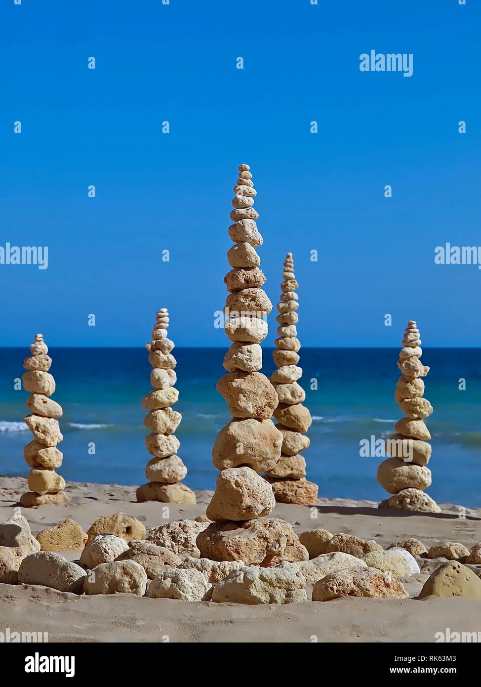 Piles of Stones, pebbles or stack of stones at the beach stand for ...