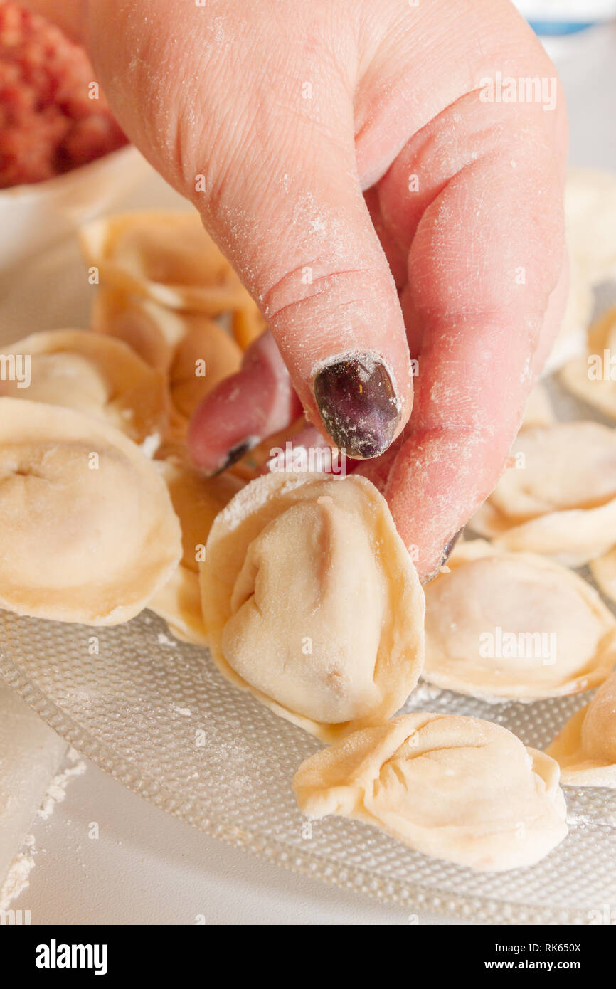 Raw and fresh is stuck on the dumplings are on the Board Stock Photo ...