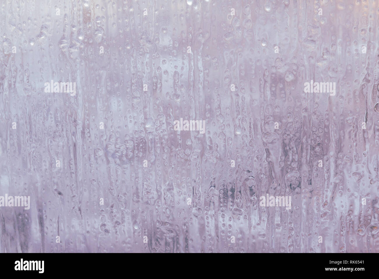Frozen window in winter with drops and drips Stock Photo - Alamy