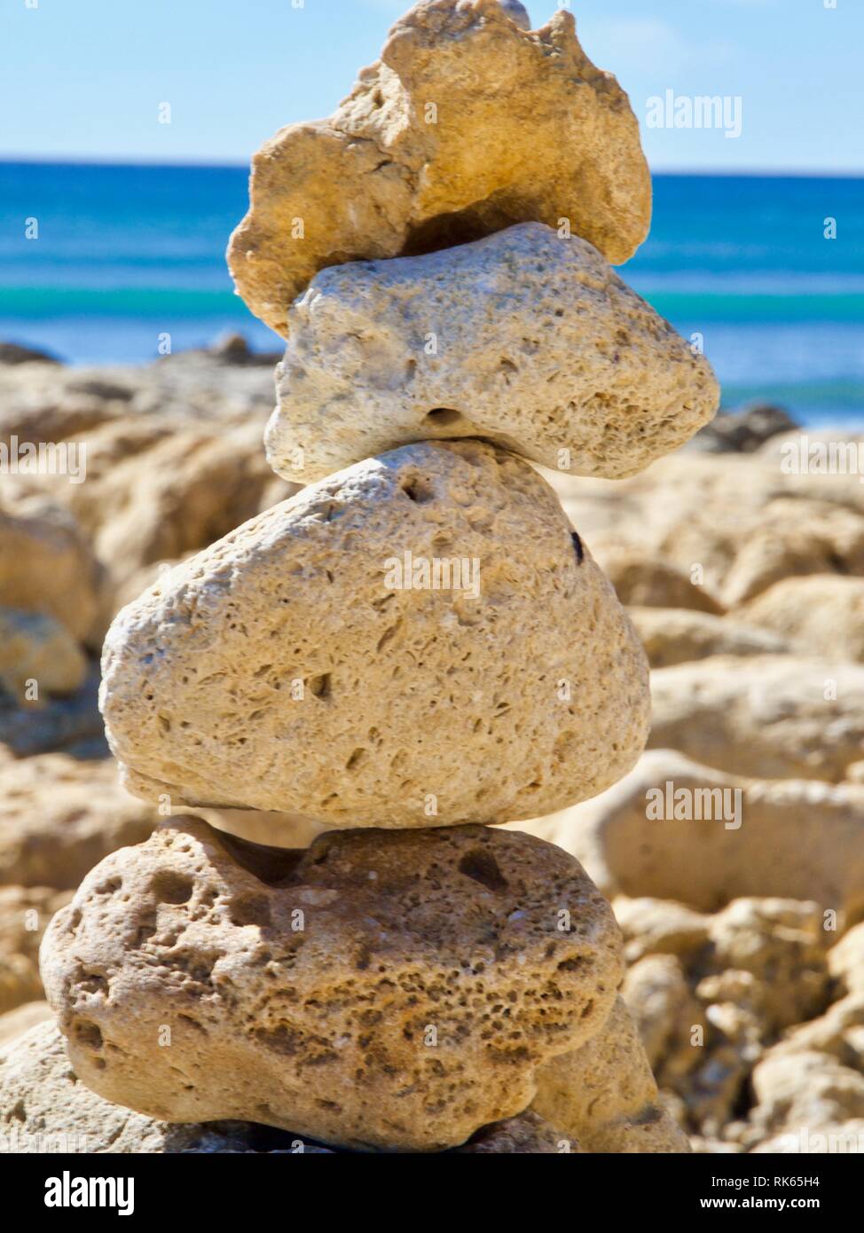 Piles of Stones, pebbles or stack of stones at the beach stand for ...