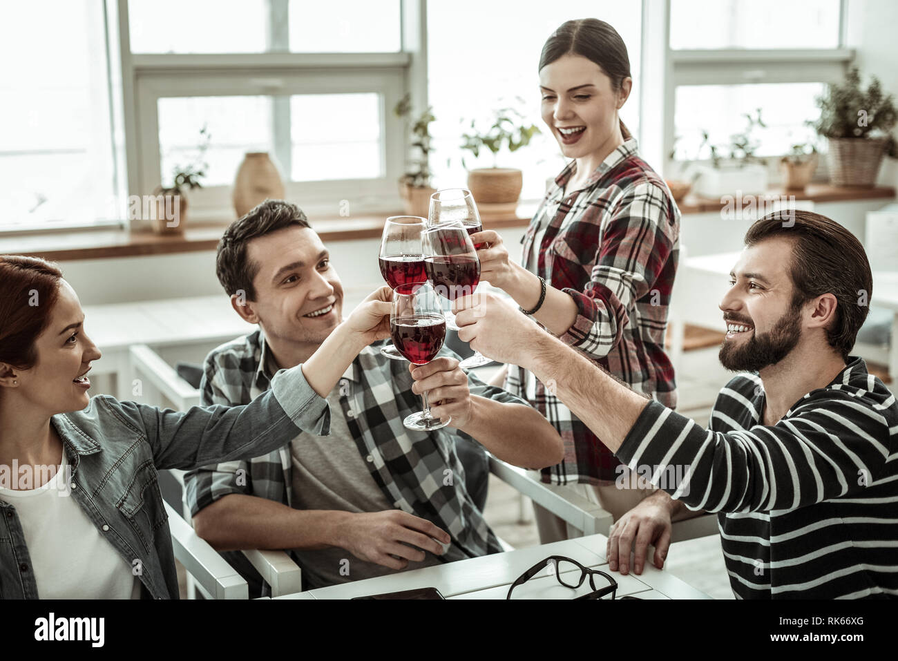 Positive delighted woman keeping smile on her face Stock Photo - Alamy
