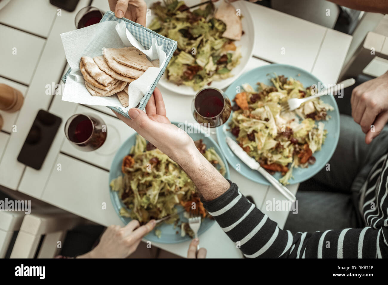 Giving bread hi-res stock photography and images - Alamy
