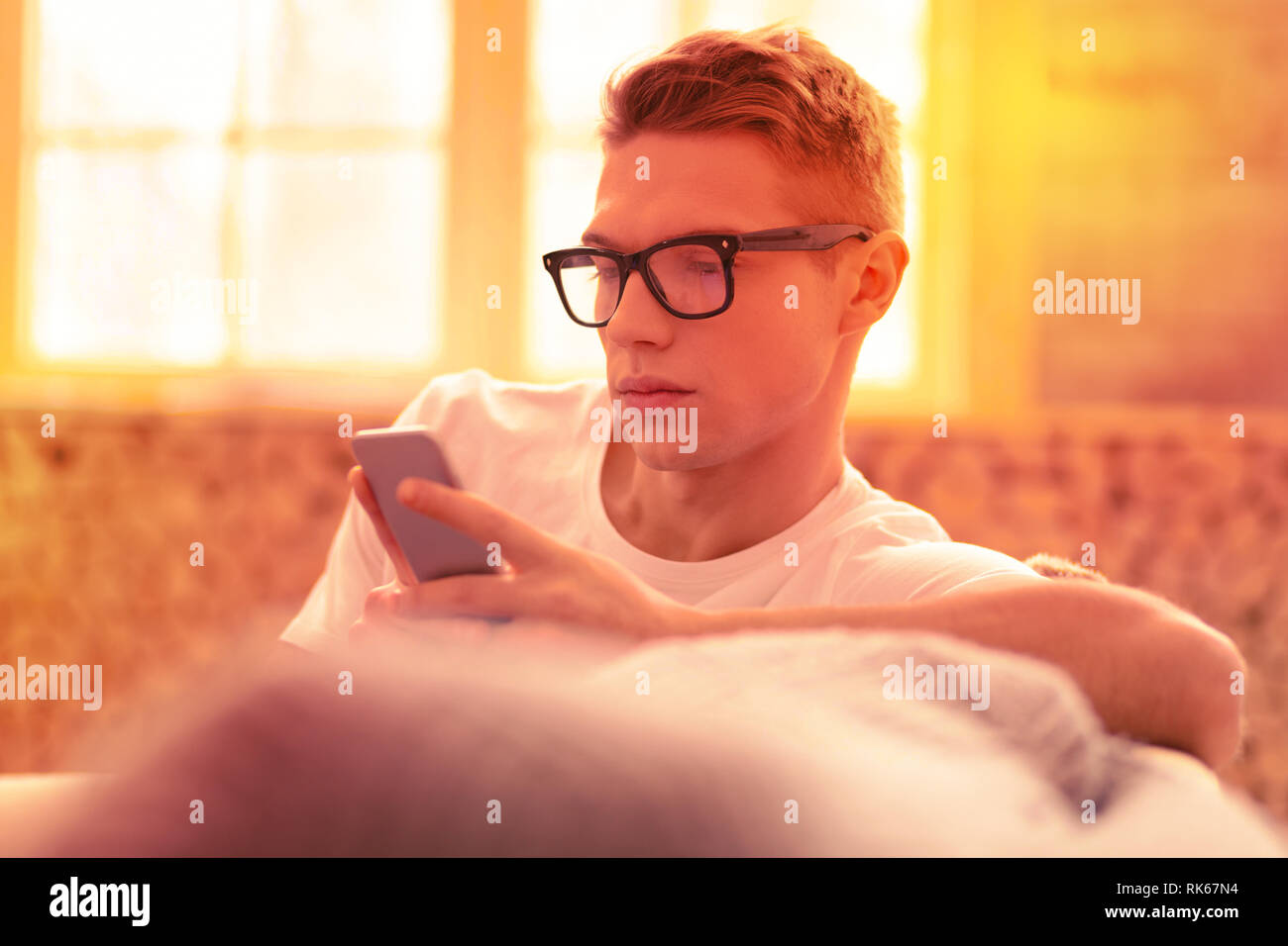 Serious texting hi-res stock photography and images - Alamy