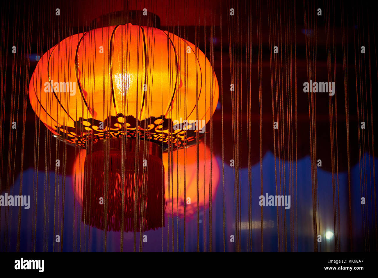 Traditional red chinese lantern with threads Stock Photo - Alamy
