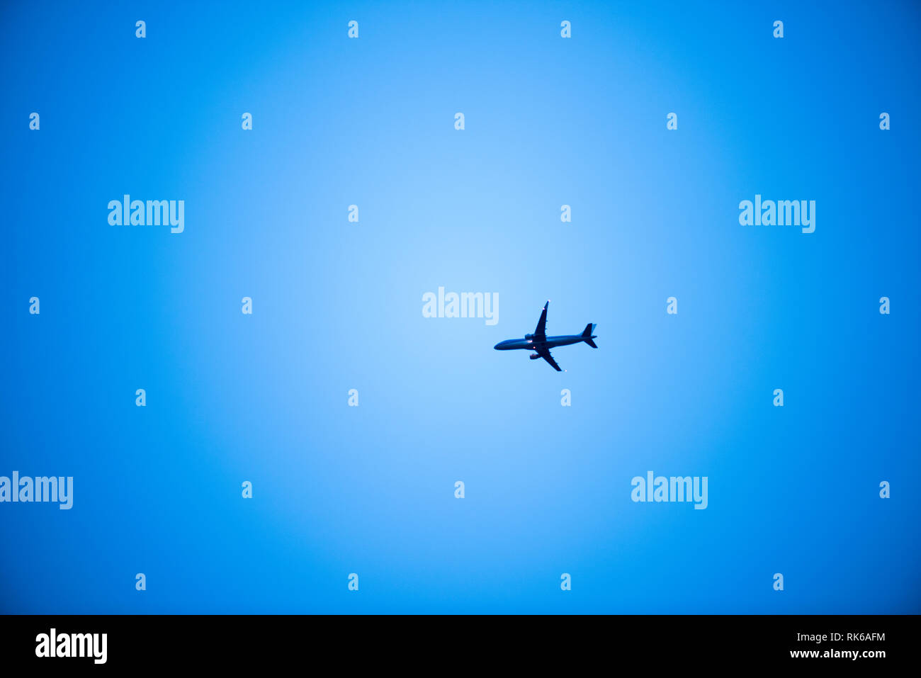 Airplane in distance hi-res stock photography and images - Alamy