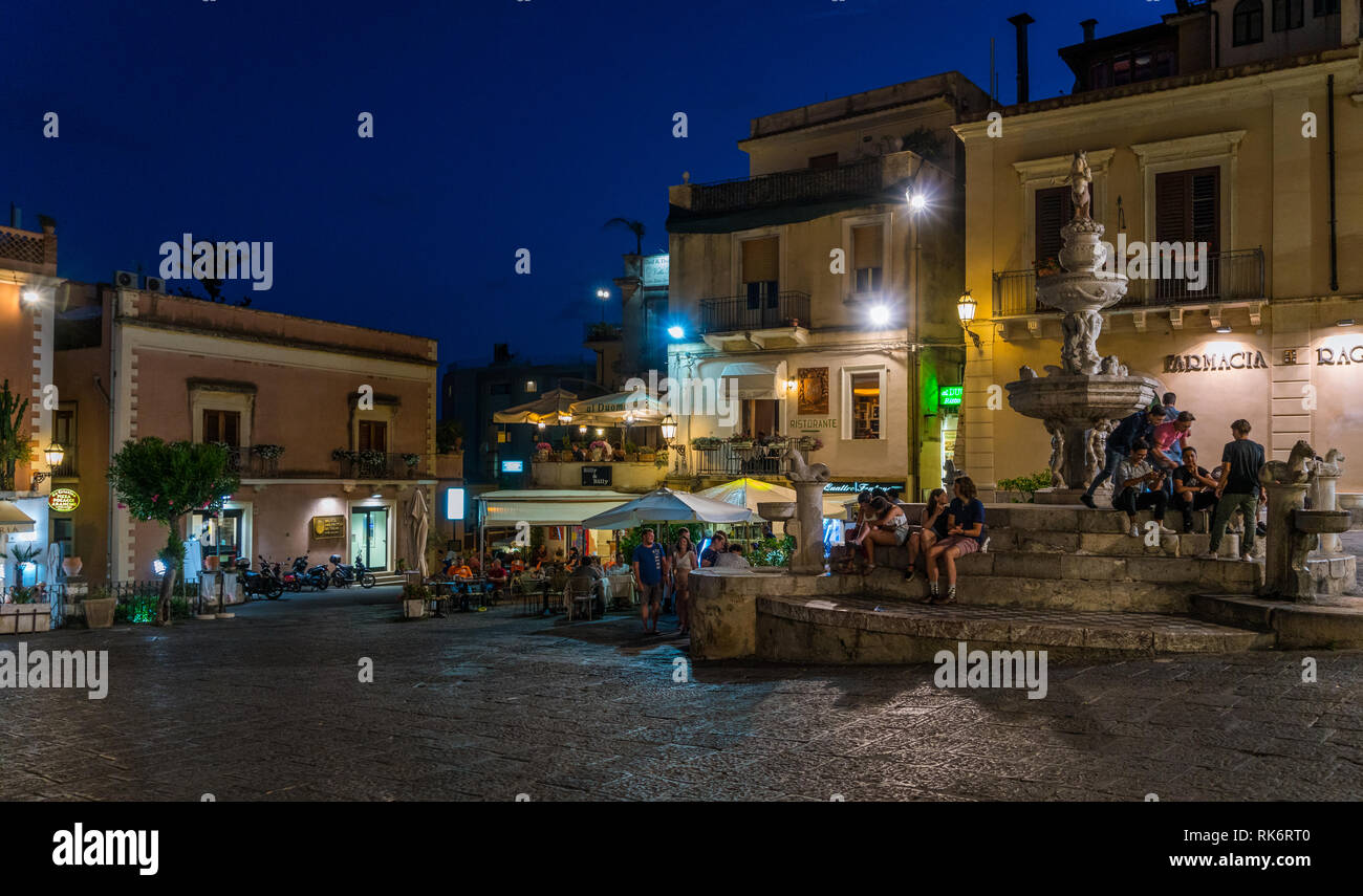 The beautiful Taormina in a summer evening. Province of Messina, Sicily ...