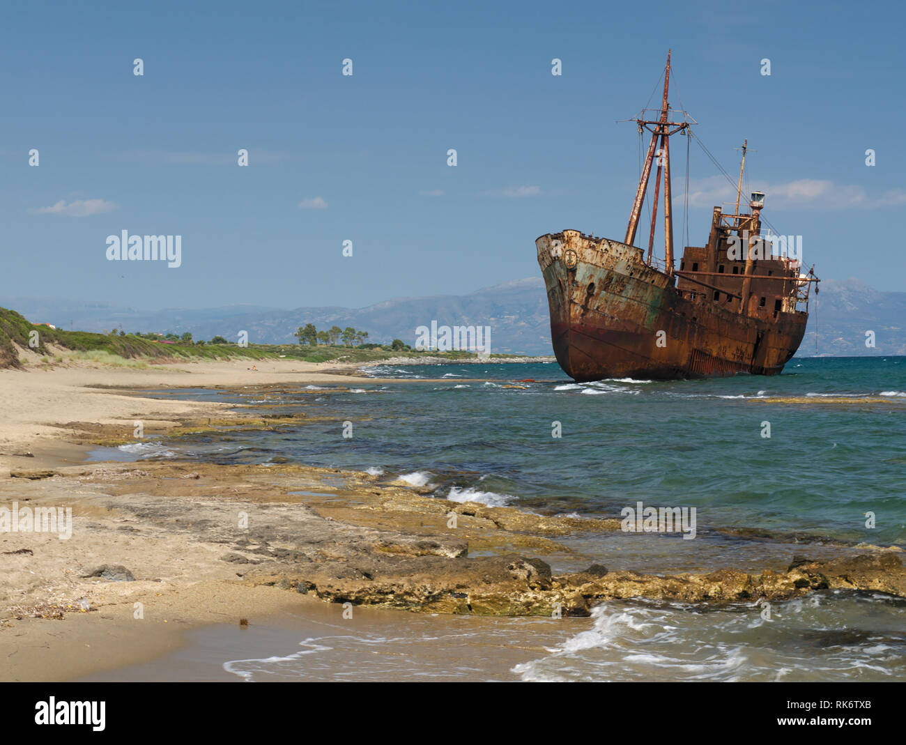 Rusty shipwreck on beach hi-res stock photography and images - Alamy
