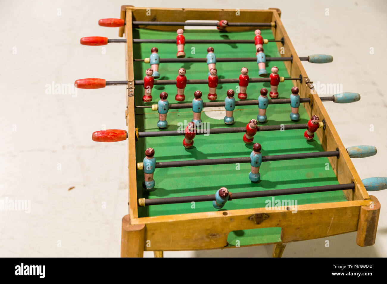 closeup of old broken foosball Stock Photo - Alamy