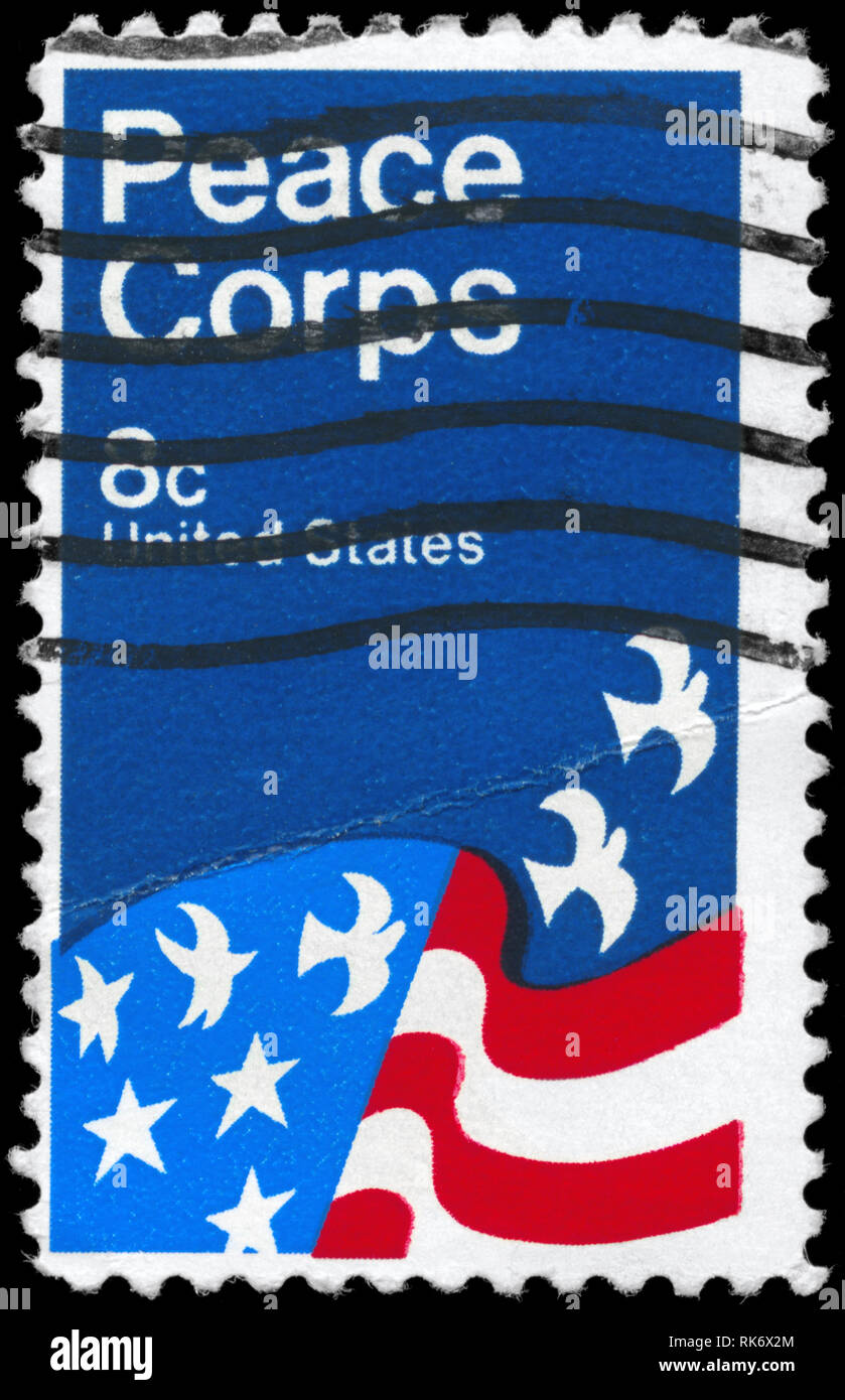 USA - CIRCA 1971: A Stamp printed in USA shows the Peace Corps Poster ...