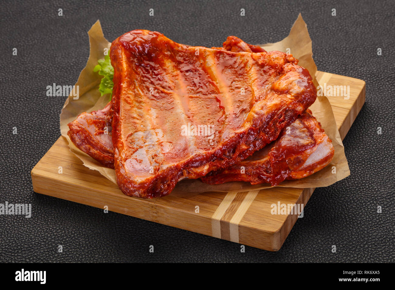 Raw marinated pork ribs ready for cooking Stock Photo - Alamy