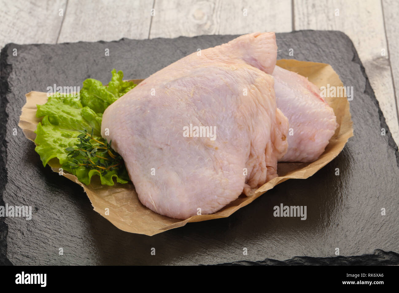 Raw chicken hip ready for cooking Stock Photo - Alamy