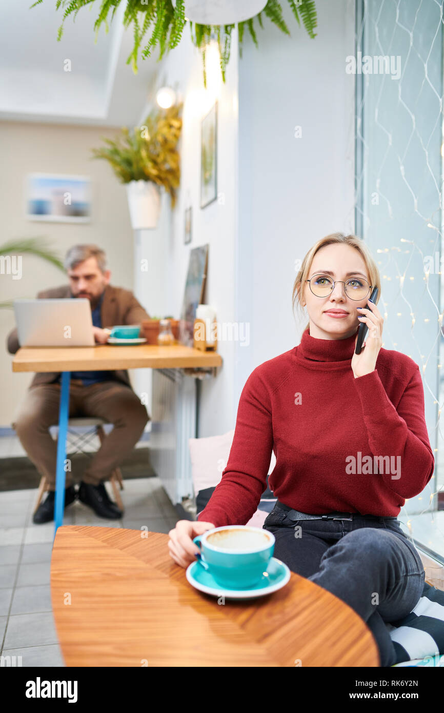 Relaxing in cafe Stock Photo - Alamy