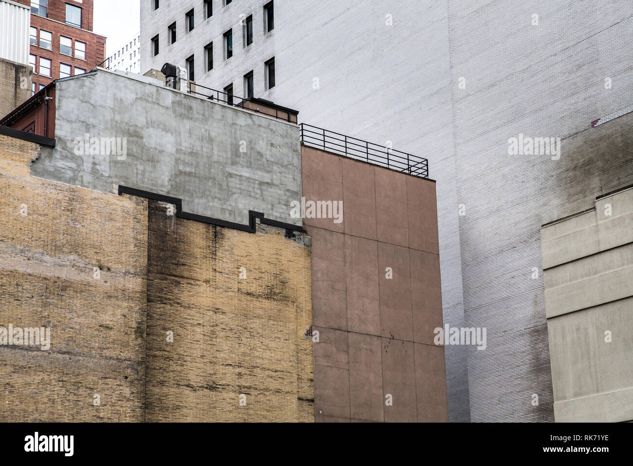 New York City cityscape of urban building facades of varying sizes and ...