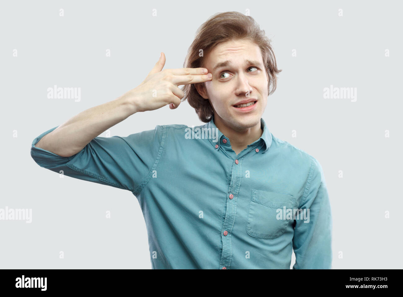 Funny businessman gun on white hi-res stock photography and images - Alamy