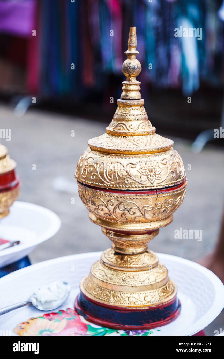 Traditional set of steamed rice container for Buddhist monks going on ...