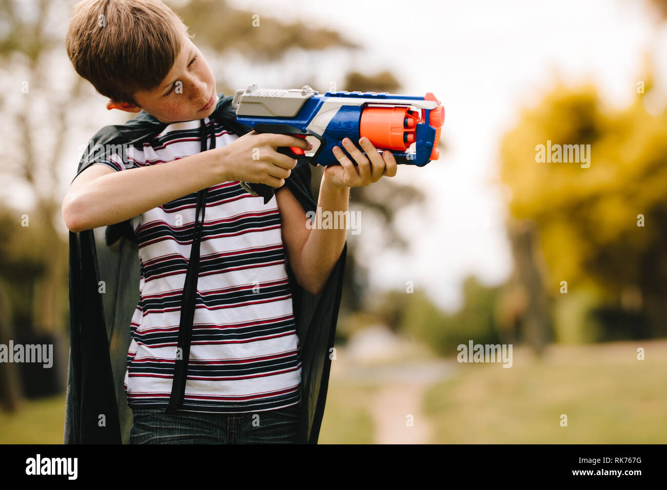Boy With A Gun High Resolution Stock Photography and Images - Alamy