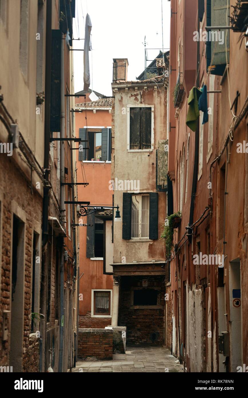 Alley view with historical buildings in Venice, Italy Stock Photo - Alamy