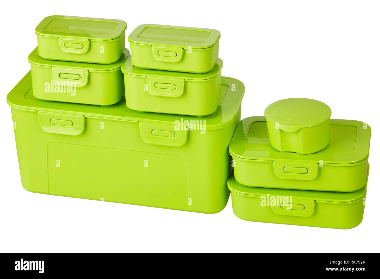 Set of similar closed green plastic food storage container isolated on ...