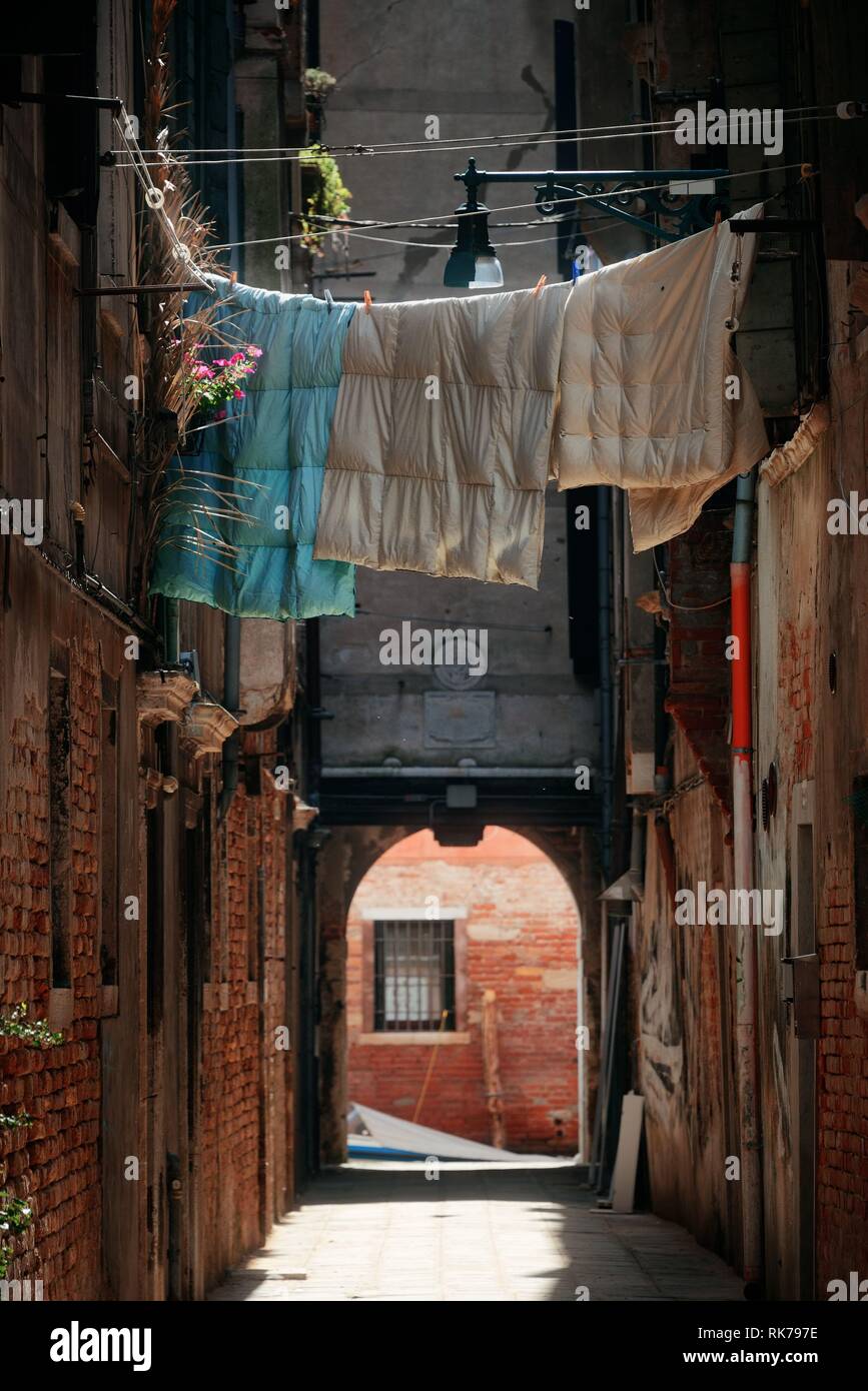 Alley view with arch and historical buildings in Venice, Italy Stock ...