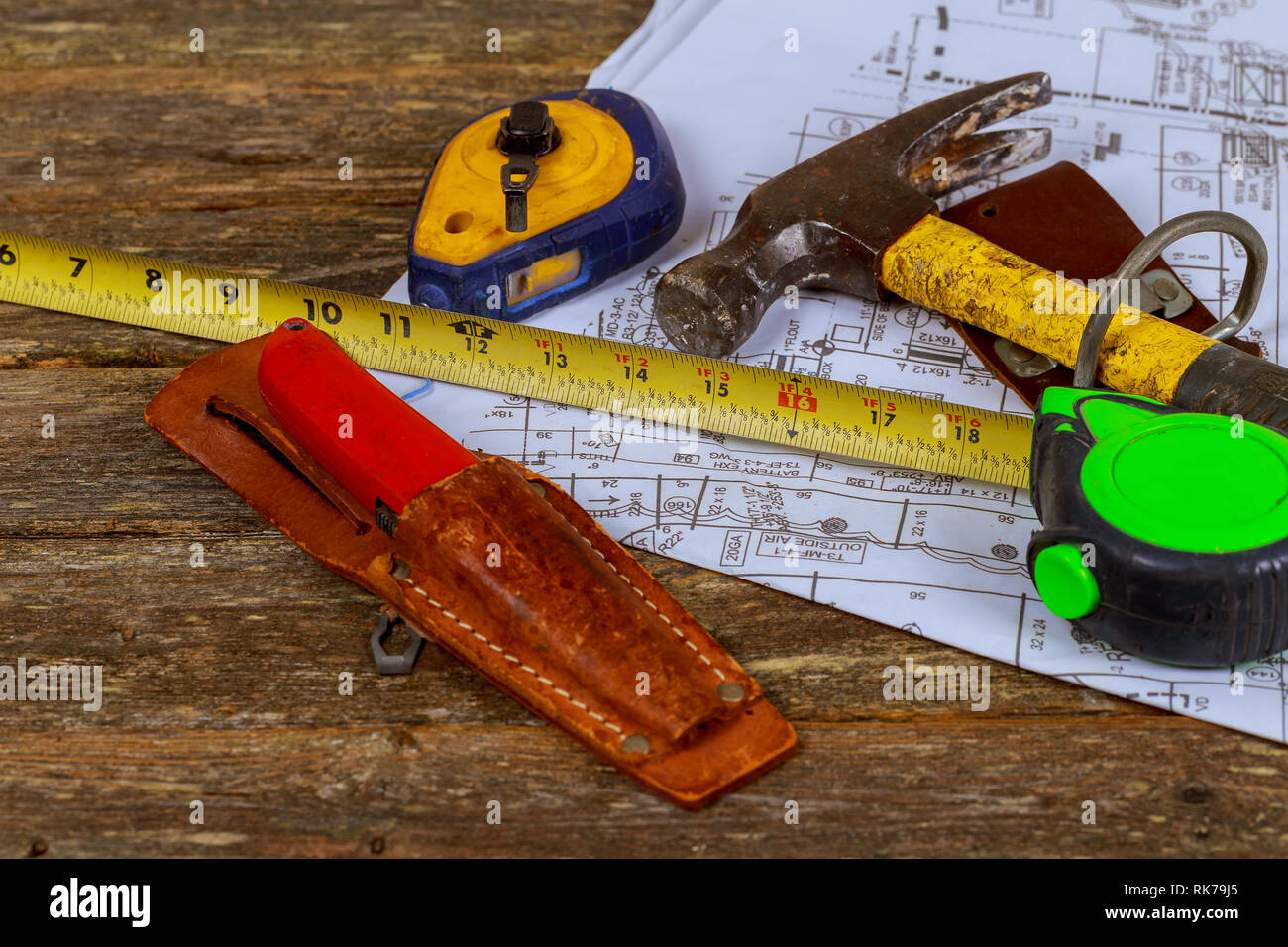 Architectural blueprints and instruments on the worktable. Construction ...