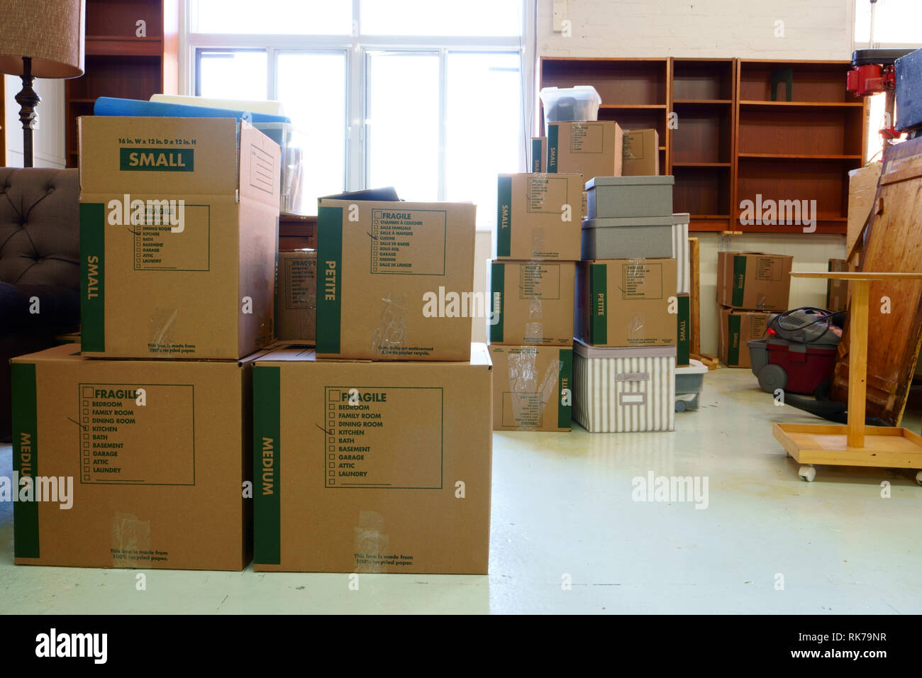 Cardboard boxes of a moving family Stock Photo - Alamy