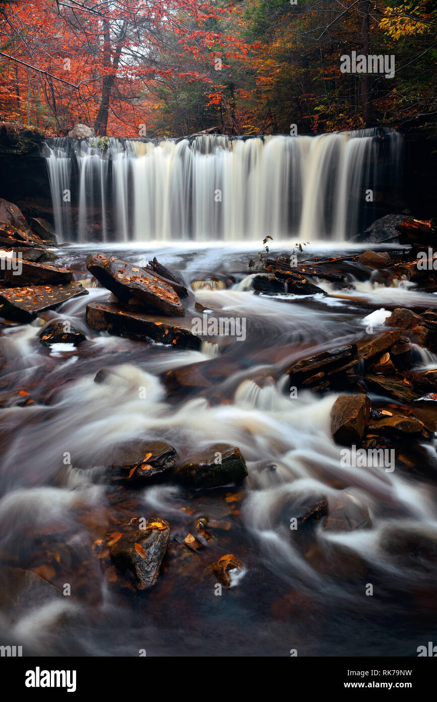 Autumn waterfalls in park with colorful foliage Stock Photo - Alamy