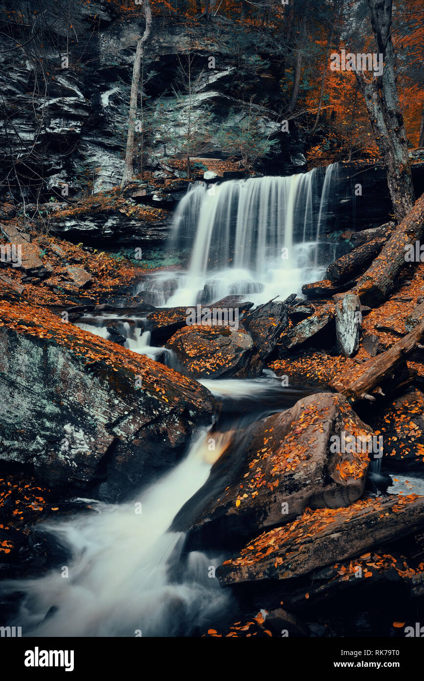 Autumn waterfalls in park with colorful foliage Stock Photo - Alamy