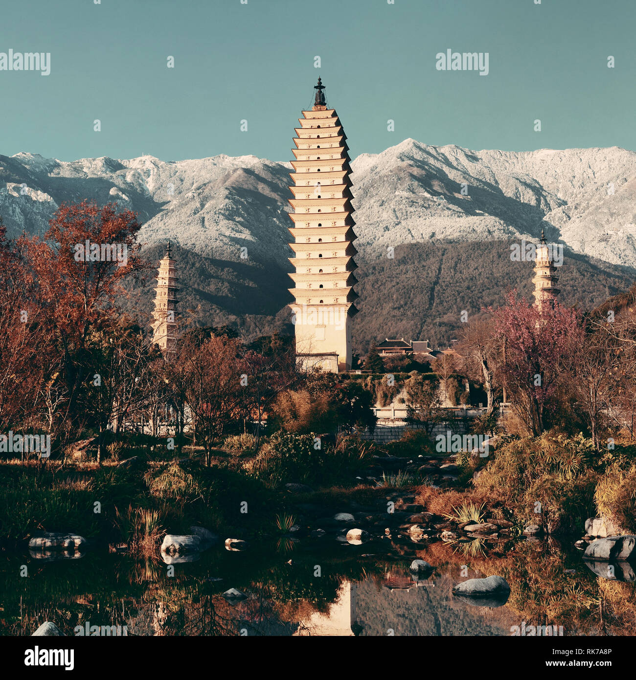 Ancient pagoda in Dali old town with snow capped Mt Cangshan, Yunnan ...