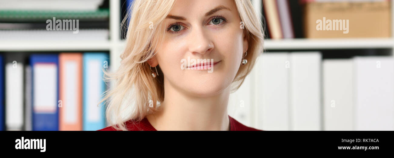Normal blond woman portrait at office Stock Photo - Alamy