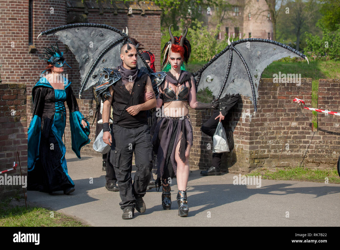 Devil and winged girl - People dressed in special outfits (enactors) at ...