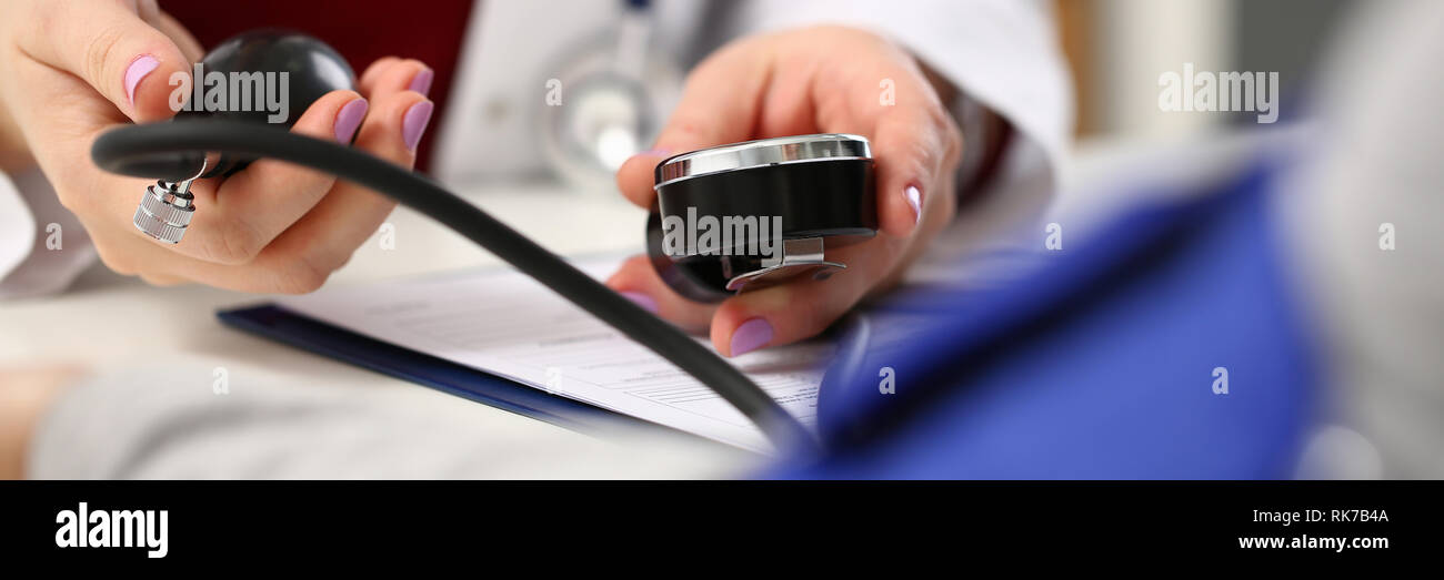 Female doctor arms make medic procedure closeup Stock Photo - Alamy