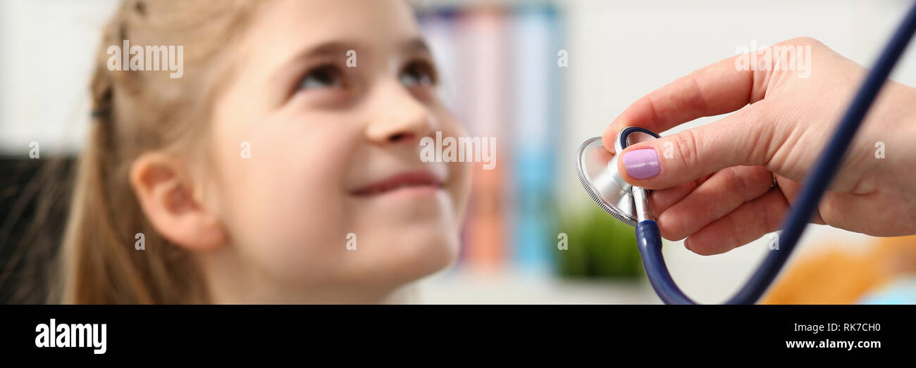 Little child at pediatrician reception Stock Photo - Alamy