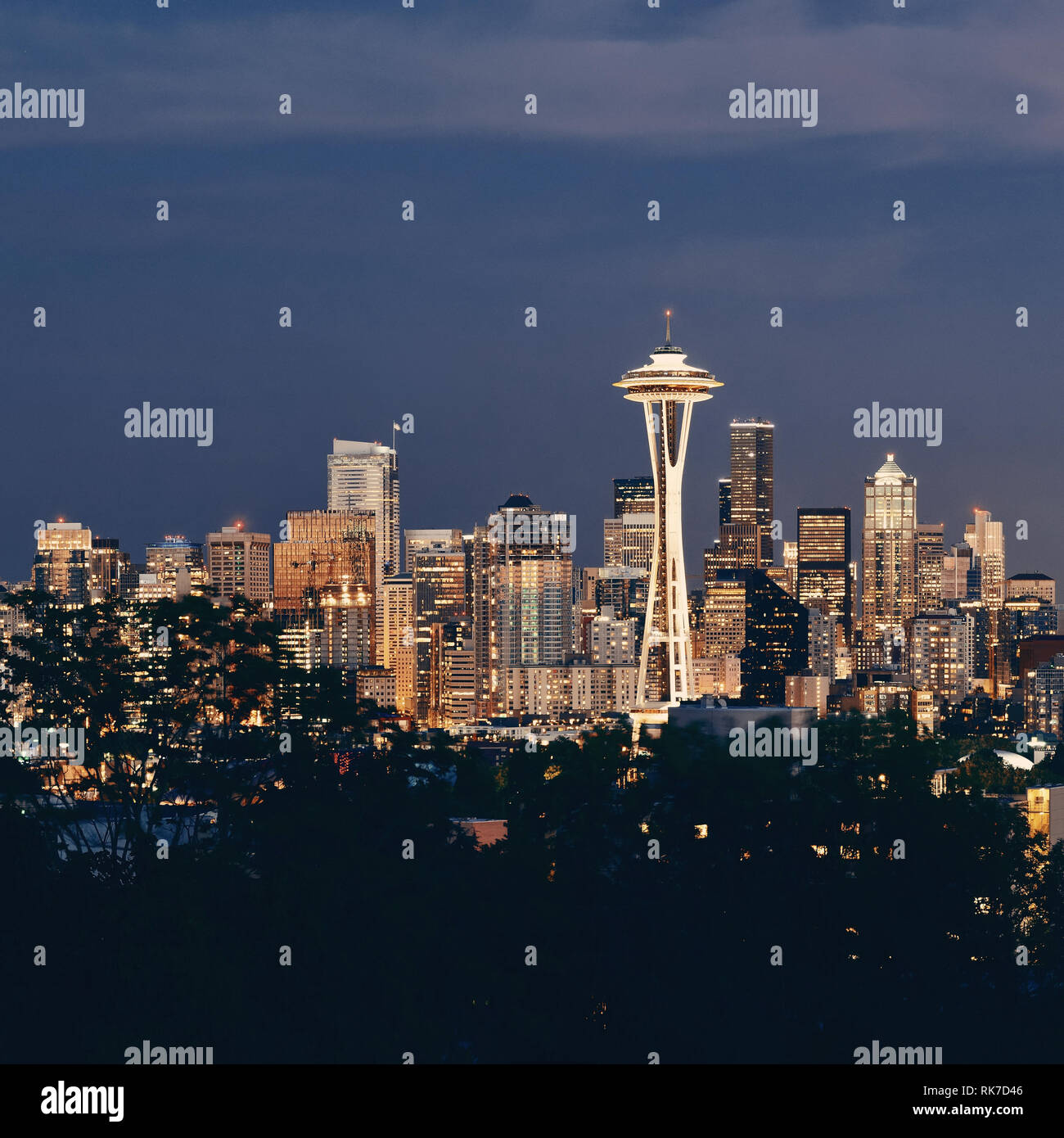 Seattle city skyline at night with urban office buildings viewed from ...