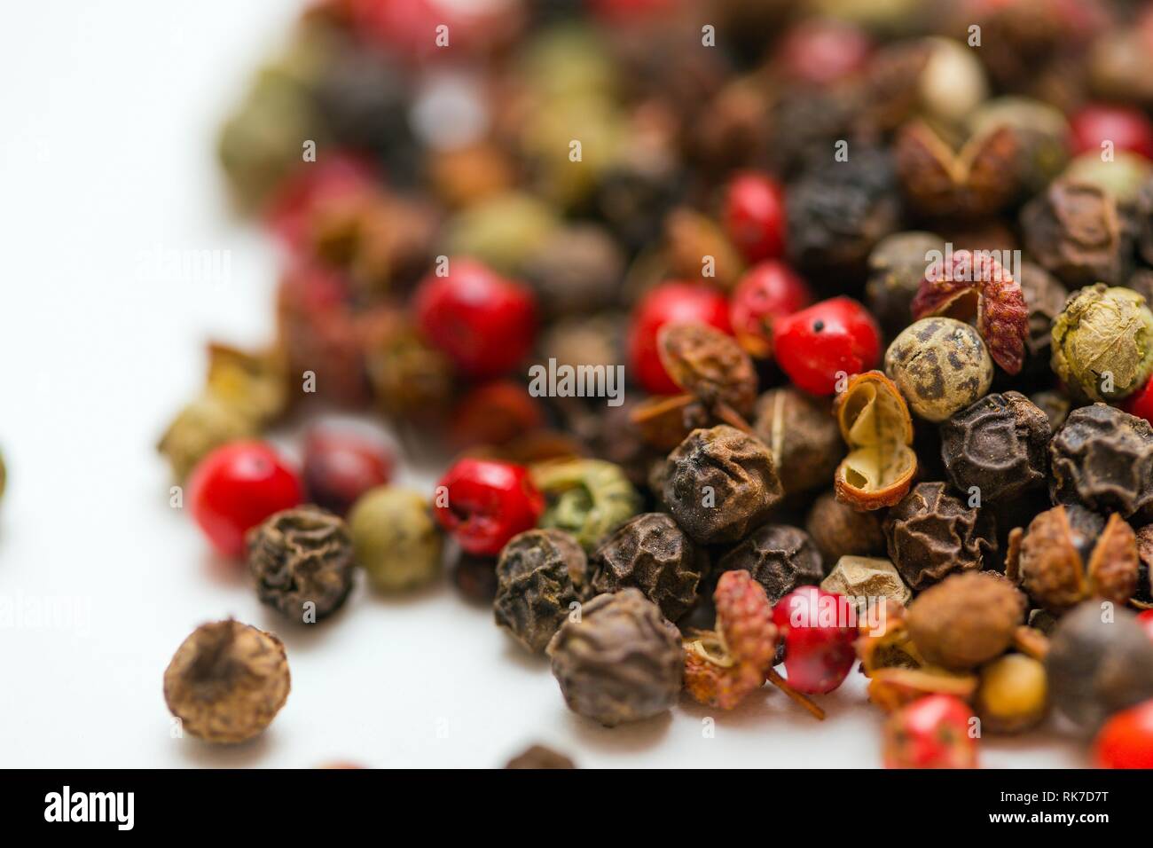 herbs and spices. heap fragrant peppers mix on a white background Stock ...