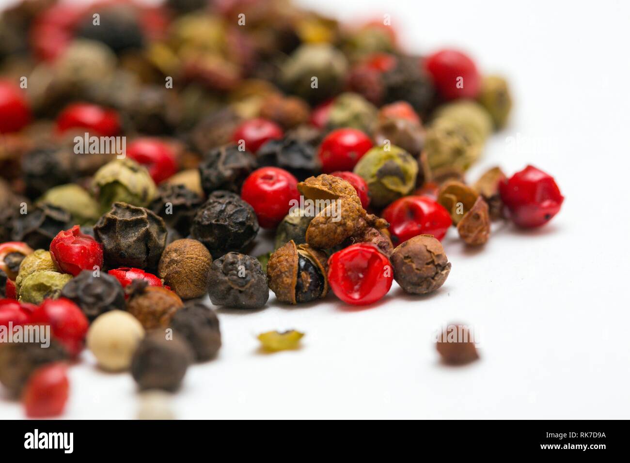 herbs and spices. heap fragrant peppers mix on a white background Stock ...
