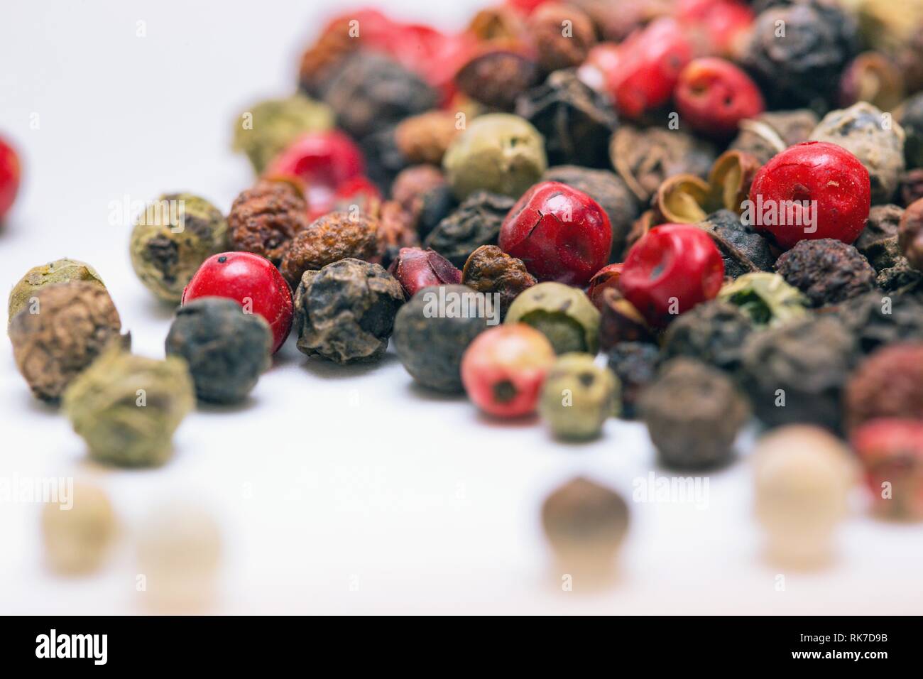 herbs and spices. heap fragrant peppers mix on a white background Stock ...