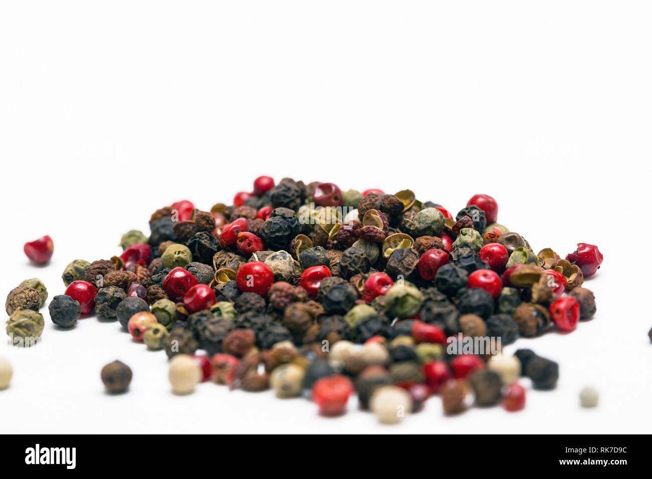 herbs and spices. heap fragrant peppers mix on a white background Stock ...