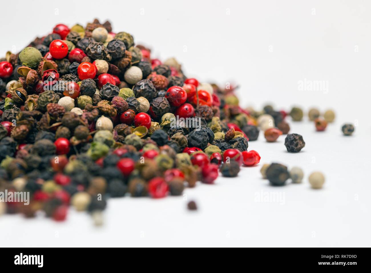 herbs and spices. heap fragrant peppers mix on a white background Stock ...
