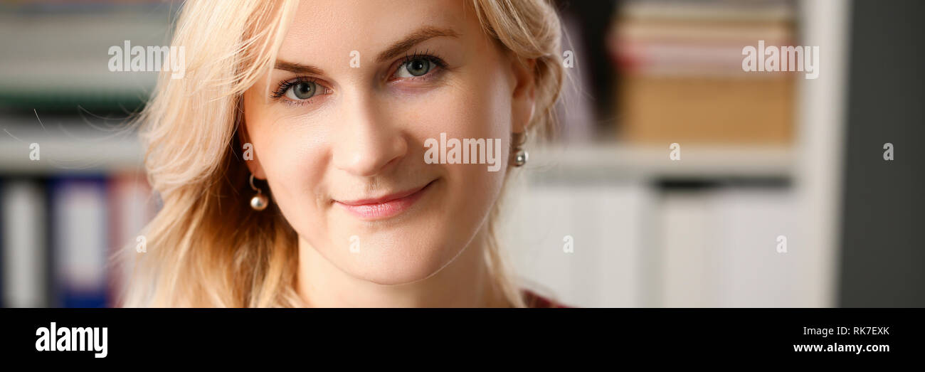 Normal blond woman portrait at office Stock Photo - Alamy