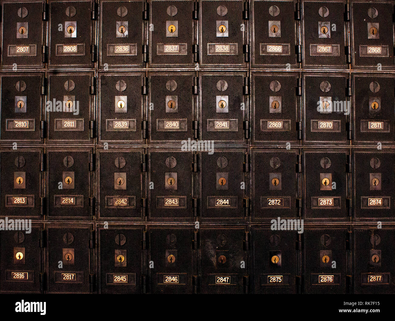 Rows of black Australia Post letter boxes with locks and numbers Stock ...
