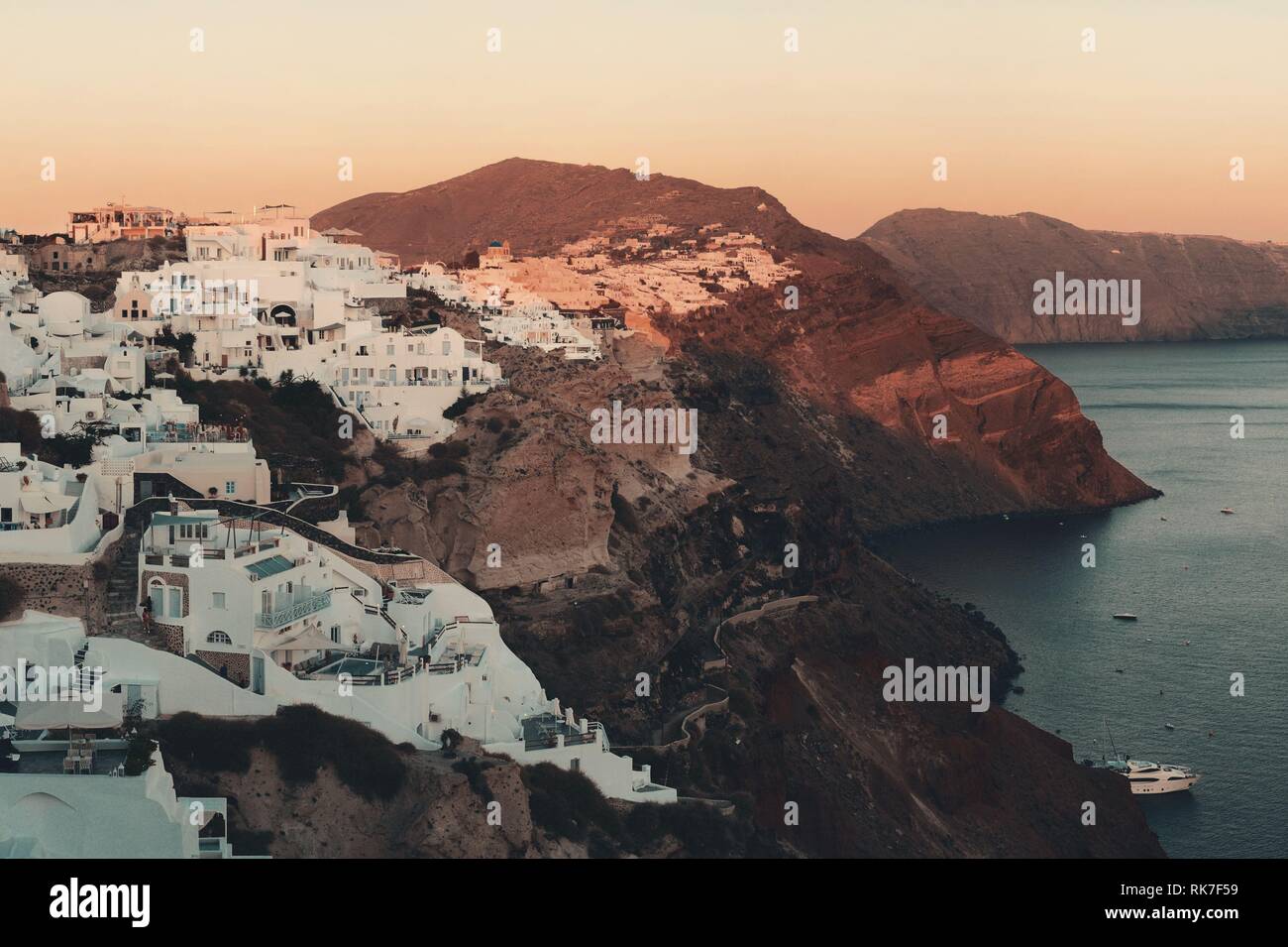 Santorini skyline sunset with buildings in Greece Stock Photo - Alamy