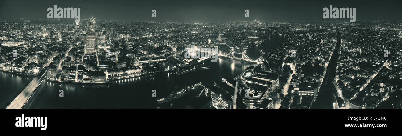 London aerial view panorama at night with urban architectures and tower ...