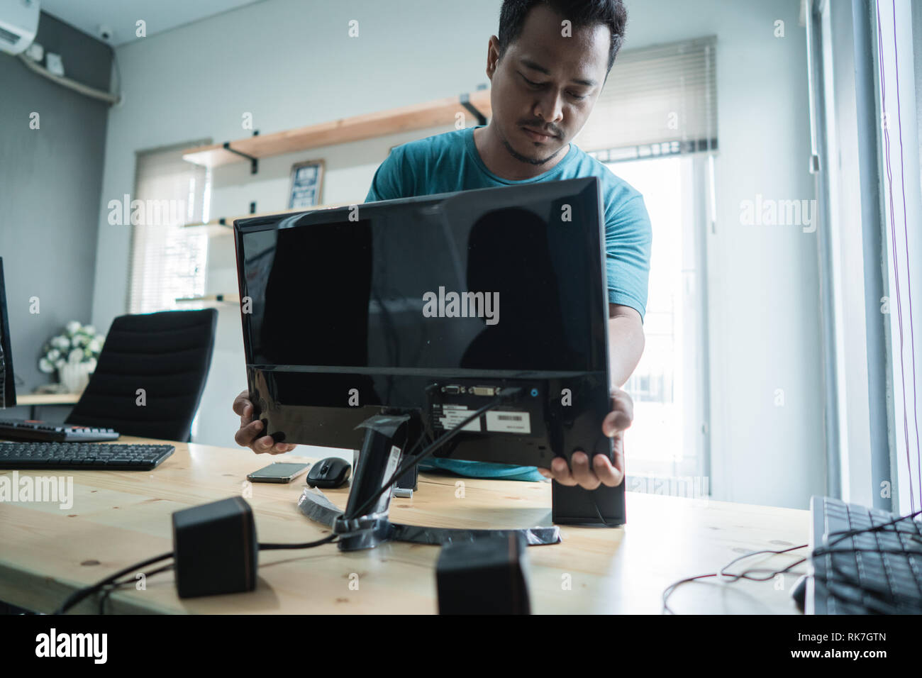 portrait of technician install a new hardware a part of personal ...