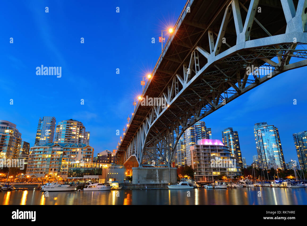 Vancouver False Creek at night with bridge and boat Stock Photo - Alamy